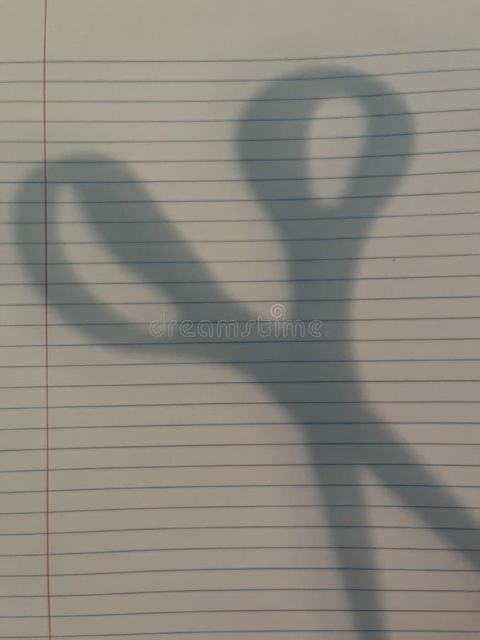 Shadow of Scissors on Lined Notebook Paper Stock Image - Image of ...