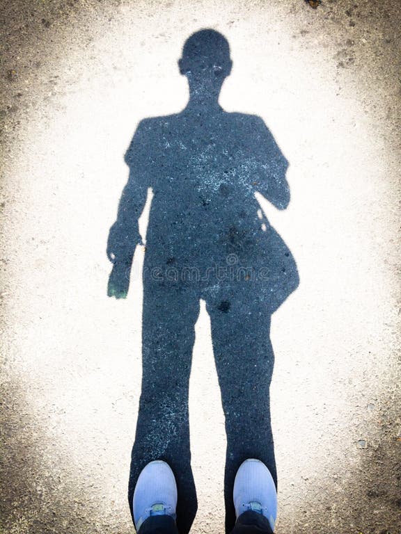 Shadow on the pavement stock image. Image of sneakers - 157188875