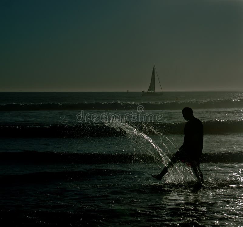 Shadow People Beach Kicking Water Stock Image - Image of thinking ...