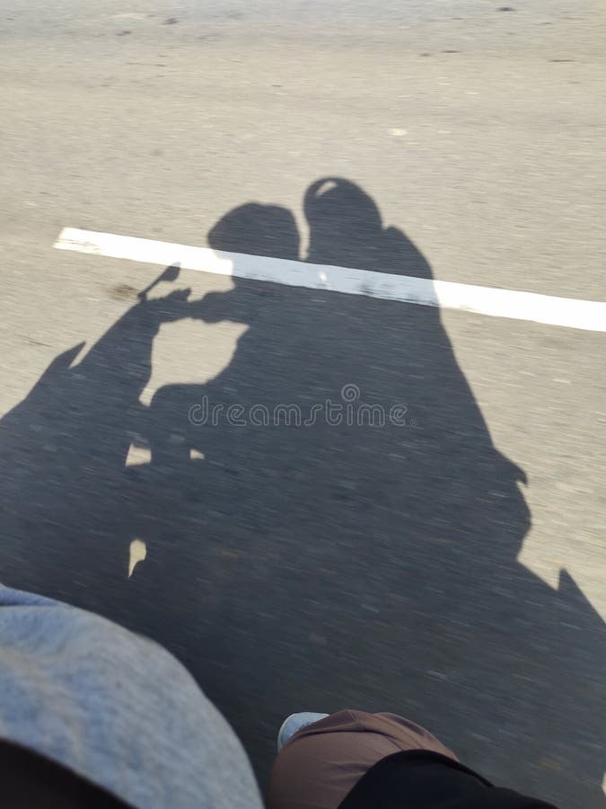 Shadow of a Person Riding a Motorcycle on the Road Stock Image - Image ...
