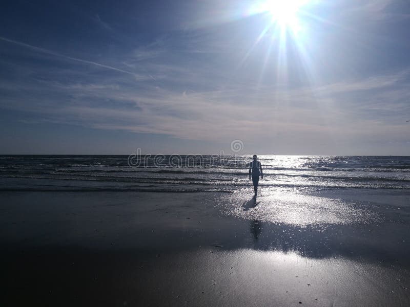 Shadow of a person stock image. Image of beach, water - 106998563