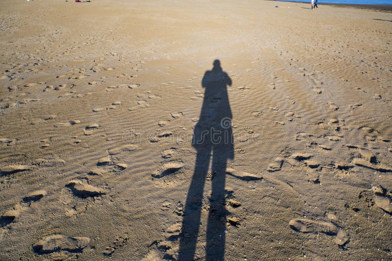 Shadow of Person on Yellow Sand on Beach Stock Image - Image of coast ...