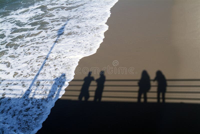 The Shadow of Some People on the Beach Stock Image - Image of sand ...