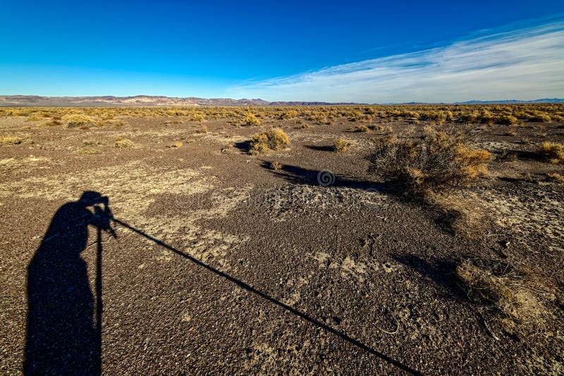 Shadow of the Photographer in the Desert Stock Image - Image of camera ...