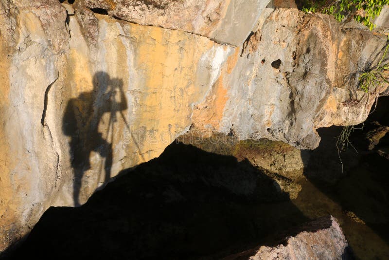 The Shadow of the Photographer on the Limestone Cave Wall Stock Image ...