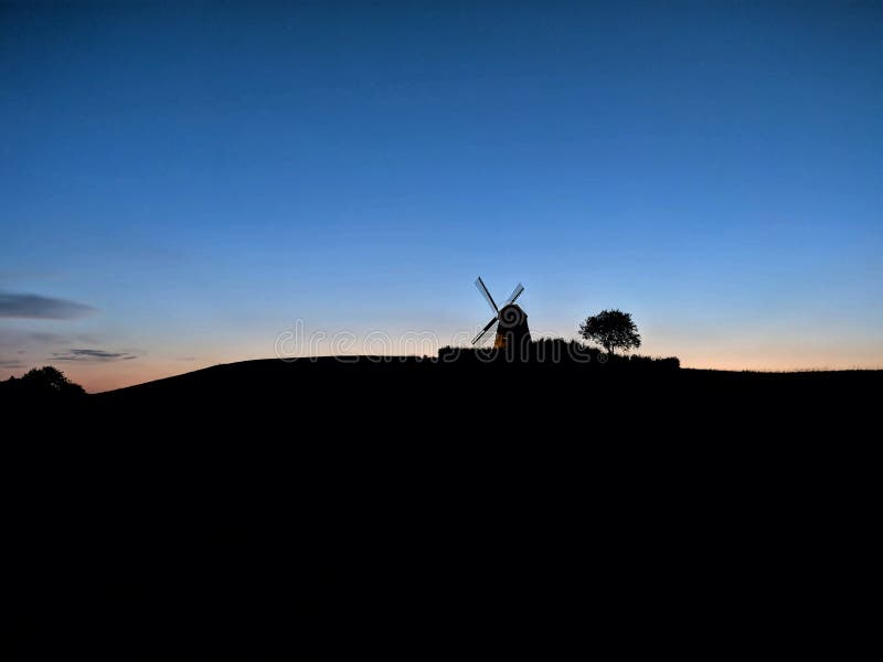 Shadow Pic stock photo. Image of windmill, blue, combination - 138990000