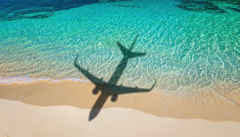 The Shadow of a Plane Flying Over a Beautiful Exotic Tropical Beach ...