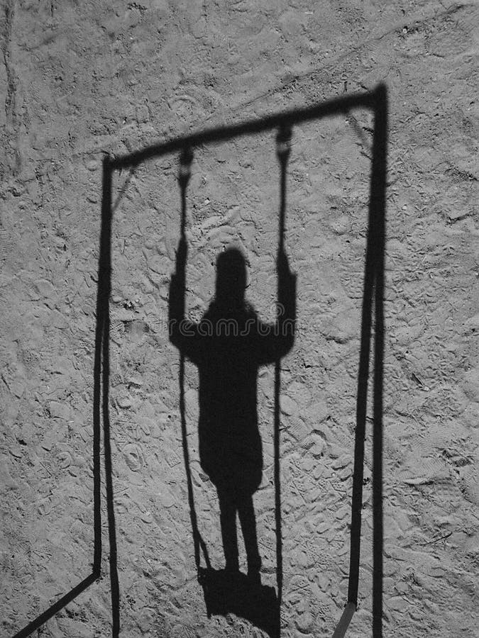 The Shadow of a Child on a Swing Stock Photo - Image of white, shadow ...