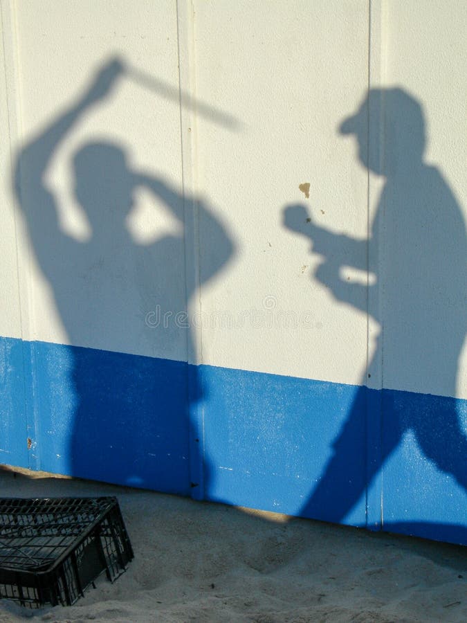 Shadow Projection on the Wall of Two Men Fighting Stock Photo - Image ...