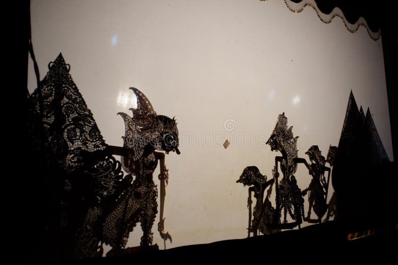 Shadow Puppet Figures on Screen Stock Photo - Image of dark, figures ...