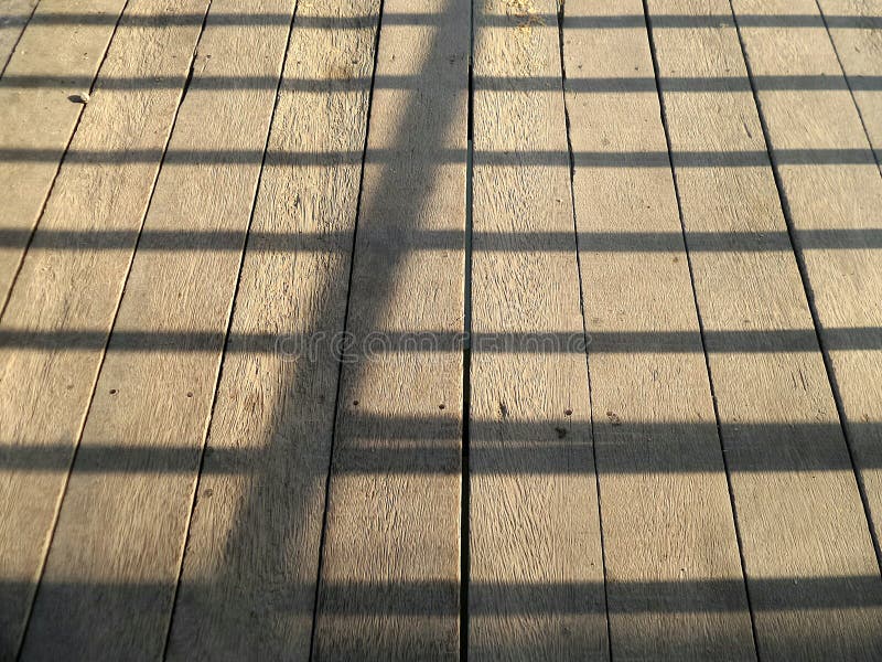 Shadow of Rail on Wooden Floor Stock Image - Image of light, terrace ...