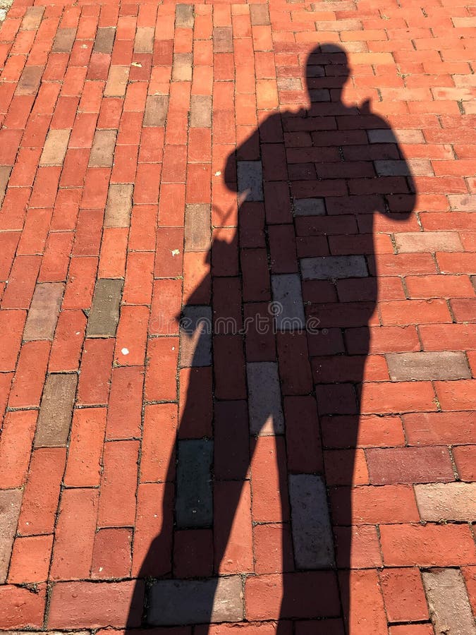 Shadow on the brick stock photo. Image of daytime, outdoors - 124117298