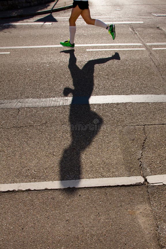 Shadow of a runner stock image. Image of field, challenge - 21636337