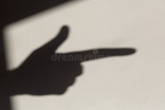 Shadow in the shape of gun stock image. Image of surface - 108167029