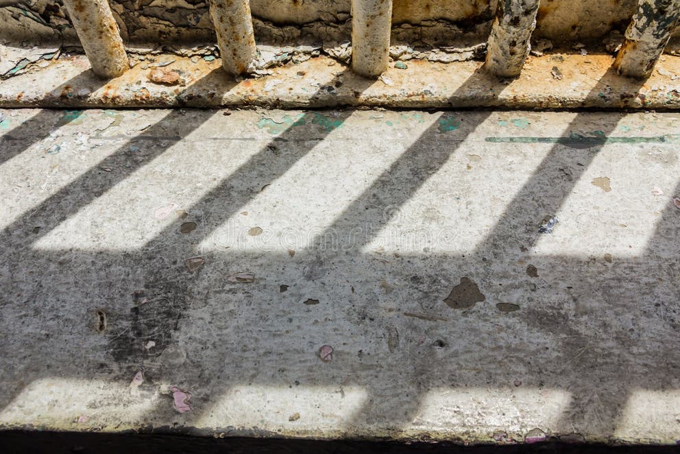 Shadow Shining through the Bars of the Old Prison Stock Image - Image ...