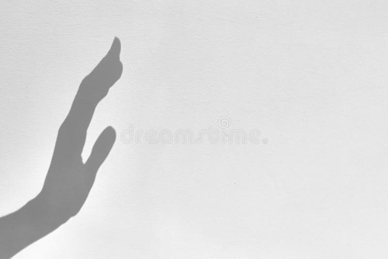 Shadow Silhouette of Hand Raised in Form of Stop Gesture, Copy Space ...