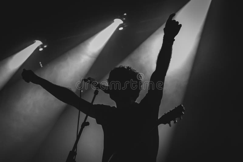 Shadow of the singer stock image. Image of rock, lights - 190854685