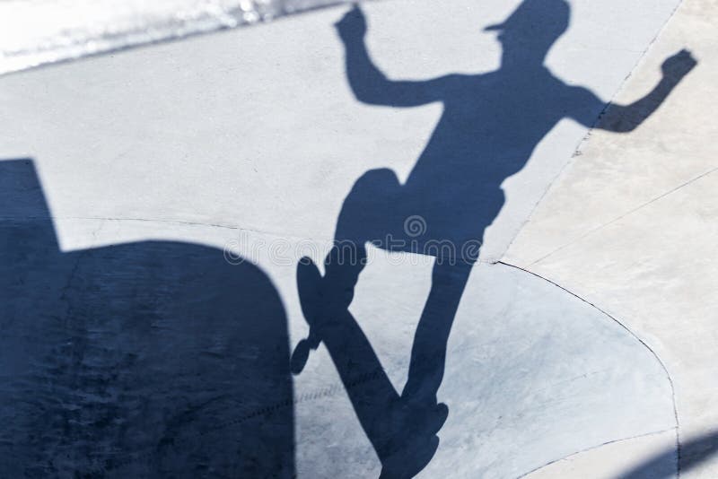 Shadow of a Skateboarder Stretched on the Ground Stock Image - Image of ...