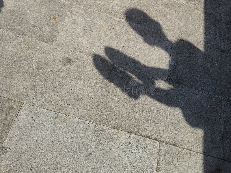 The Shadow of a Small Child Sitting Stock Photo - Image of girl, active ...