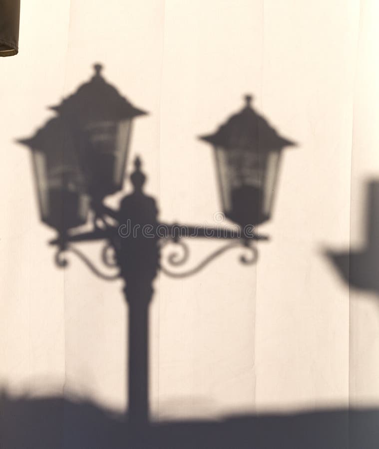 Shadow of Street Light on a Wooden Boardwalk Stock Photo - Image of ...