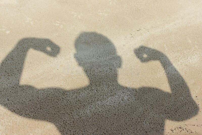 The Shadow Strong Man on the Sand Stock Photo - Image of male ...