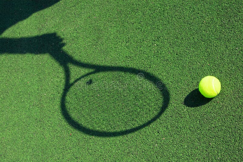 Shadow of a Tennis Racket in Hand with a Ball Stock Image - Image of ...