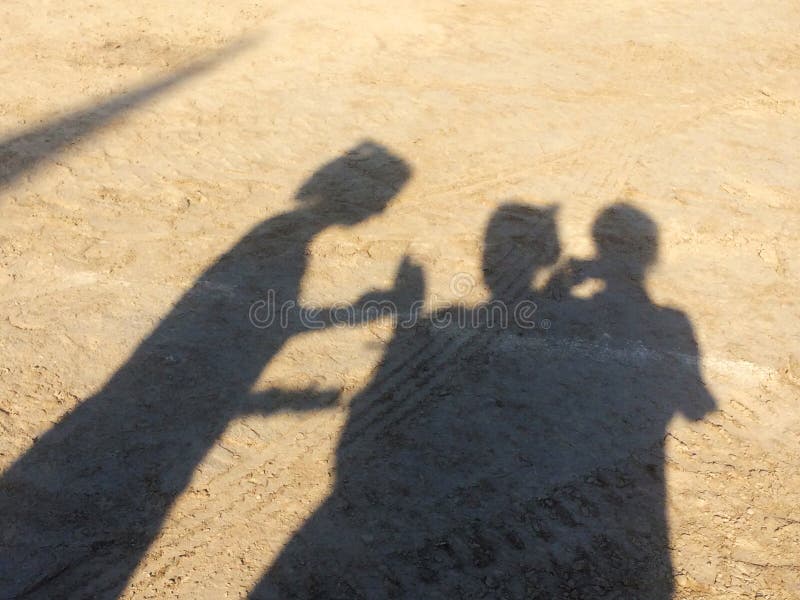 Shadow of three girls stock image. Image of perspective - 308320989