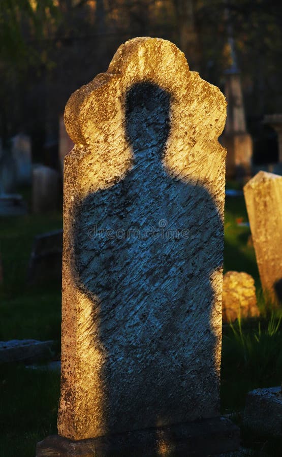 Shadow on tombstone. stock photo. Image of scotia, graveyard - 218469564