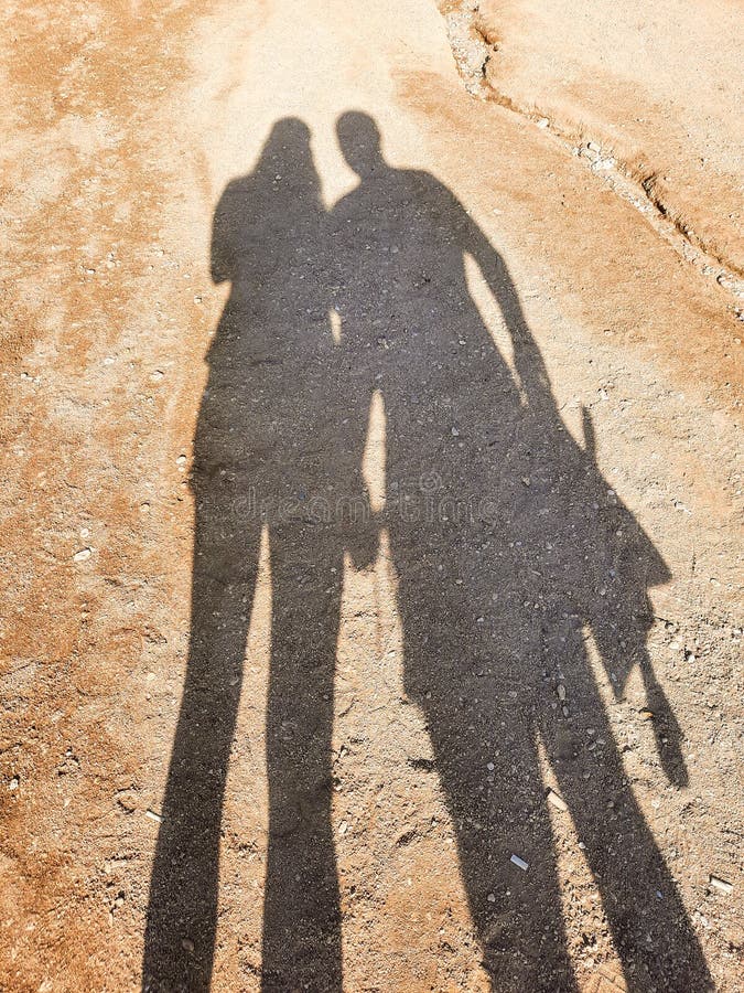 Shadow of Tourists on the Beach Sand Stock Image - Image of surface ...
