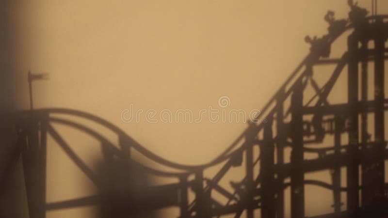 Shadow of a Toy Rolling Roller Coaster Stock Video - Video of shadow ...