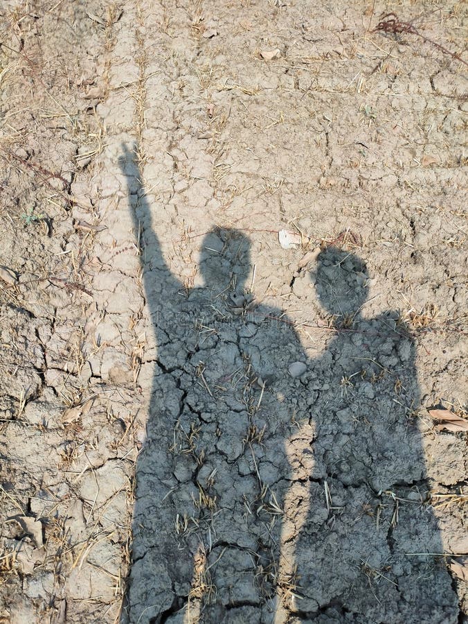 Shadow of two men stock photo. Image of arid, climate - 247960238