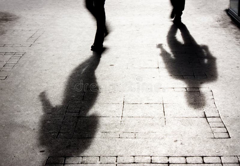Shadow of Two Person on Patterened Sidewalk Stock Image - Image of ...