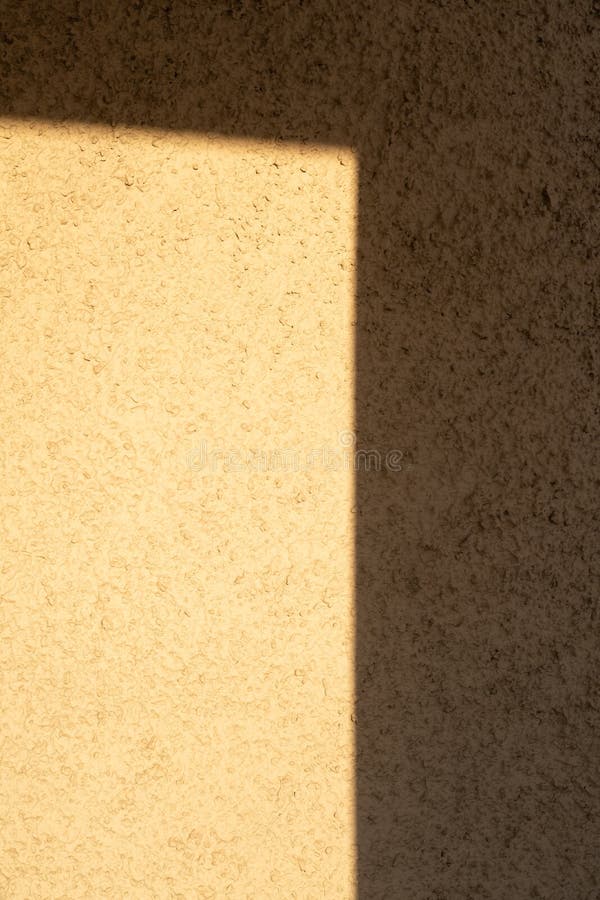 A Shadow on the Wall in the Rays of the Setting Sun. Stock Photo ...
