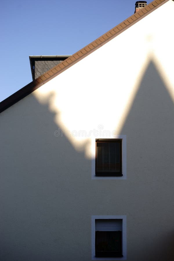 Shadow on the Wall of a Residential Building Stock Image - Image of ...