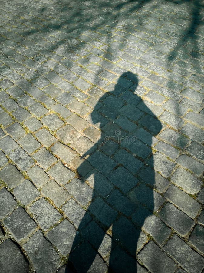 The Shadow of a Woman on Cobblestone, and Walking Alone in Sunshine ...