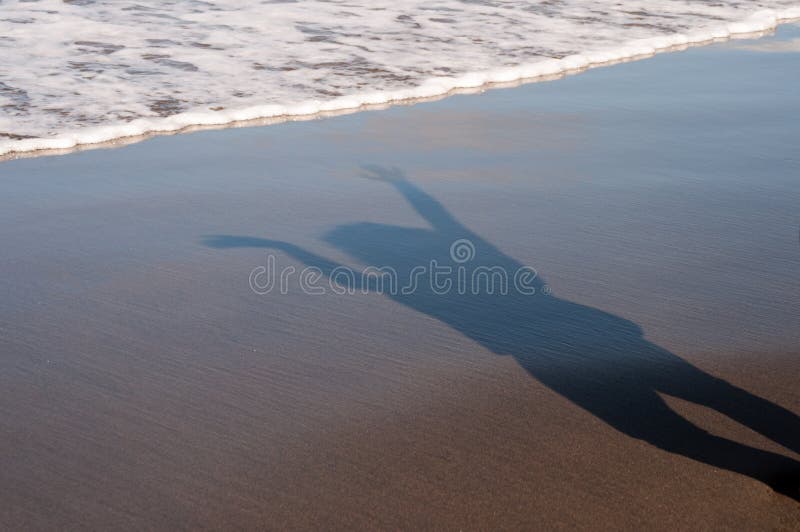 Shadow of Young Woman on the Beach Stock Image - Image of wave, sand ...