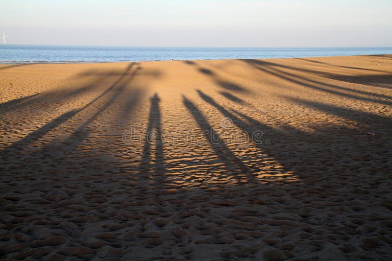 Beach shadows stock photo. Image of sand, shadows, beach - 66417084