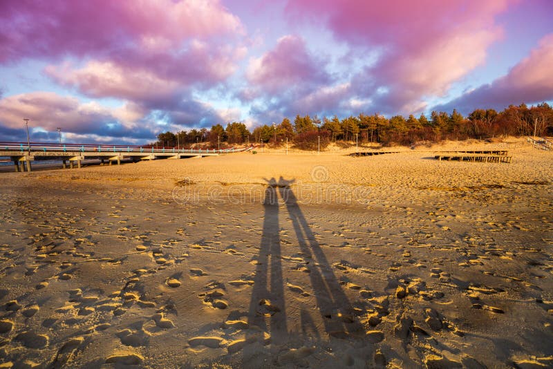 Shadows on the Beach at Sunset Stock Image - Image of horizon, baltic ...
