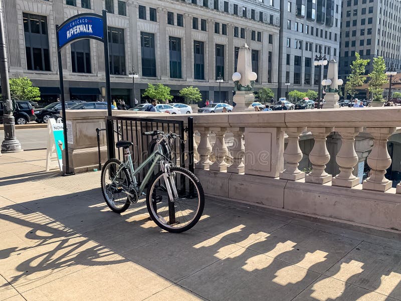 Shadows Create Patterns of Bike and Railing Along Chicago River in ...