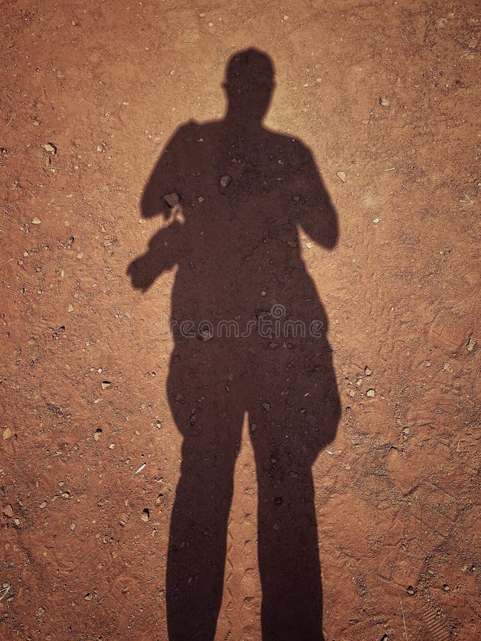 Shadows Do Tell so Much and so Does this One of a Photographer Stock ...