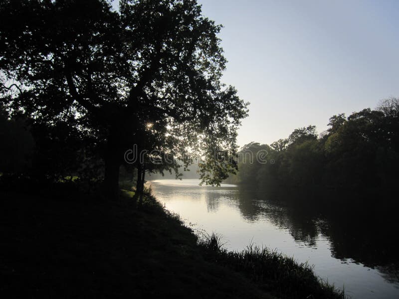 Shadows at Dusk stock photo. Image of river, shade, black - 128446376