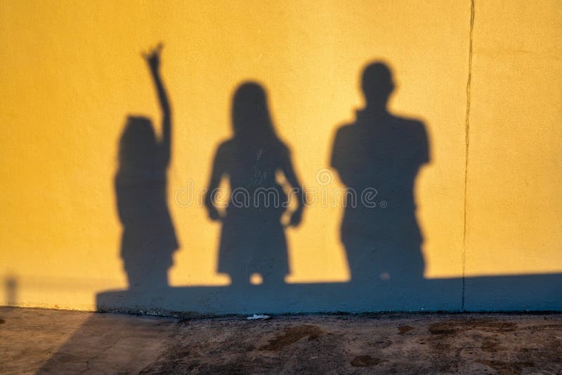 Group of Human Shadows on the Brick Wall Stock Image - Image of ...