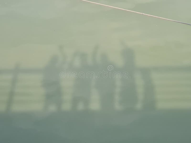 Shadows stock image. Image of bridge, light, people - 243205941