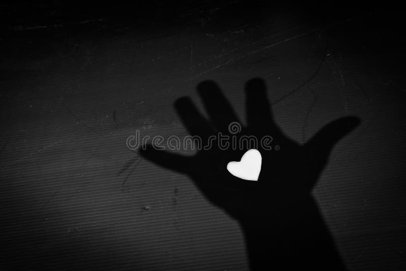 Shadows of Hands Holding a Mini Heart Valentines Day Stock Photo ...