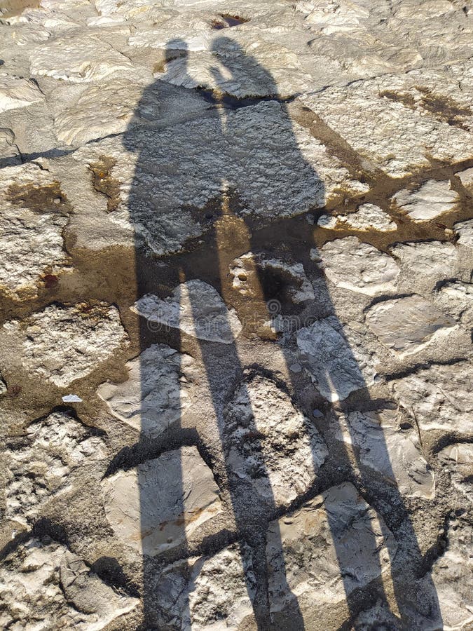 The Shadows of Humans on the Stones Stock Image - Image of wood ...