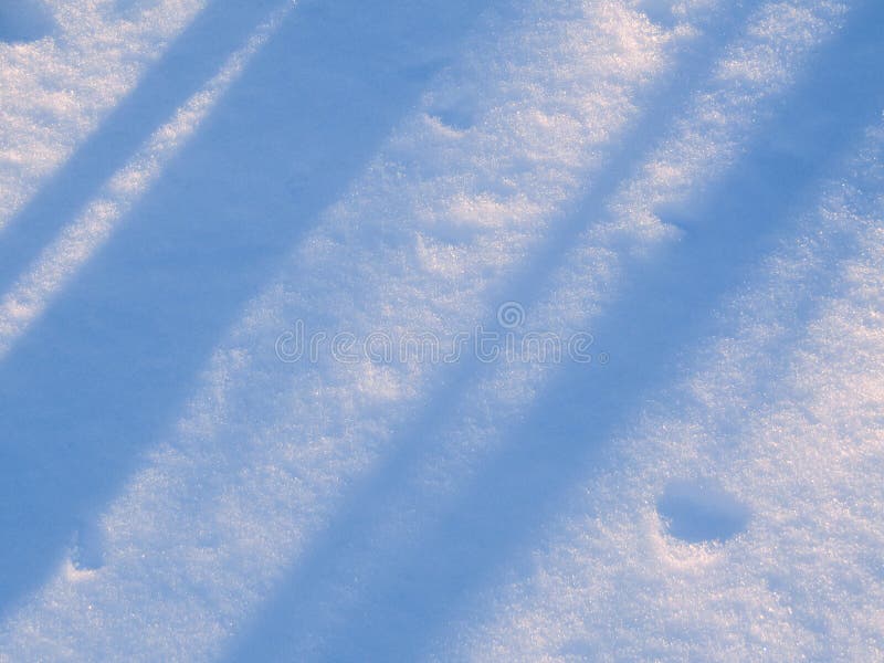 Shadows and Patterns on the Surface of Snow Stock Photo - Image of ...