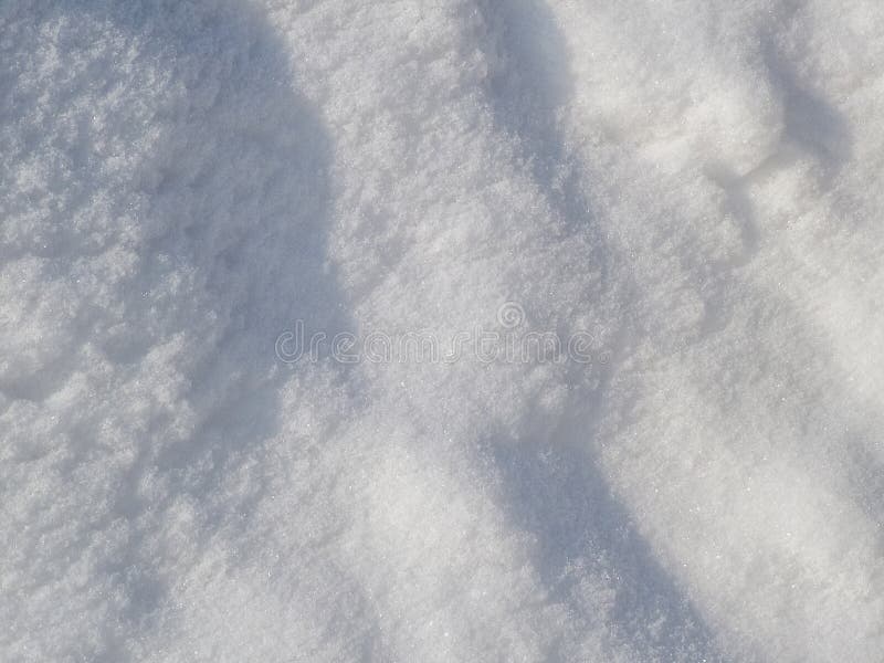 Shadows and Patterns on the Surface of Snow Stock Image - Image of ...