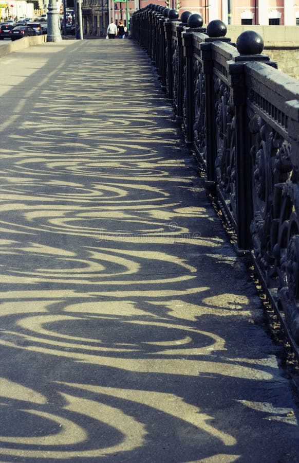 Shadows on the pavement stock image. Image of shadow - 74763501