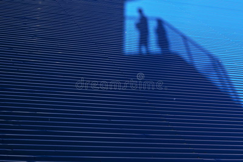 Shadows from People on the Blue Roof Stock Image - Image of roof ...