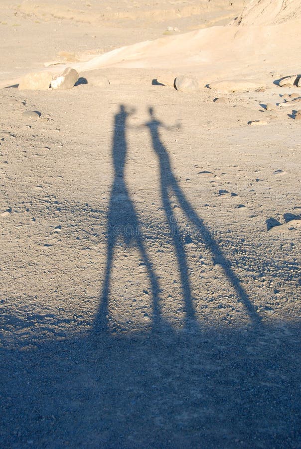 Shadows of People in the Desert Stock Image - Image of rocks, evening ...